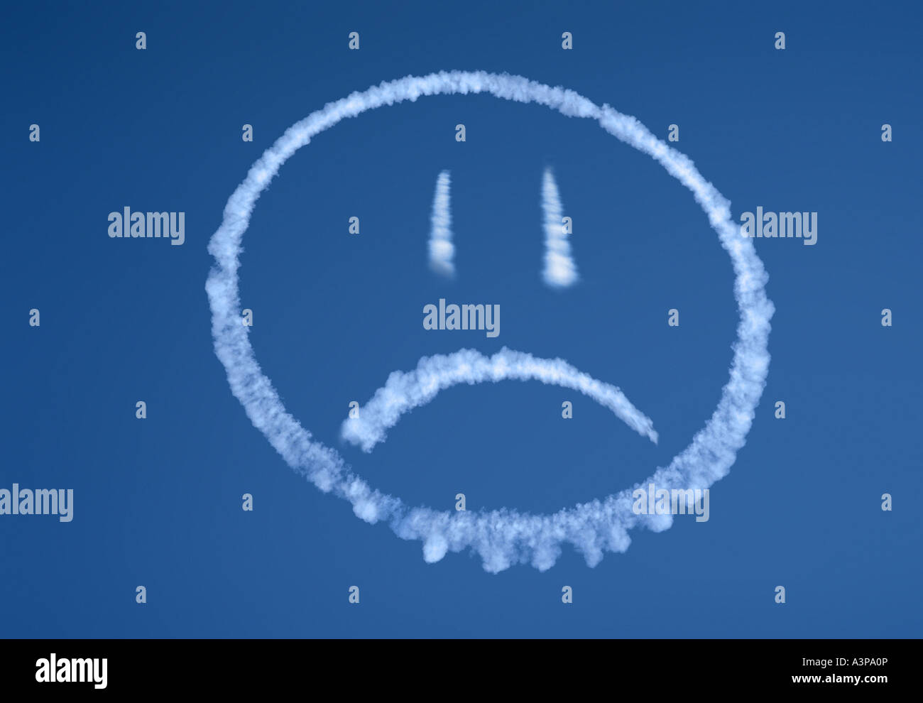 Smiley face with a sad expression in smoke trail from skywriting Stock ...