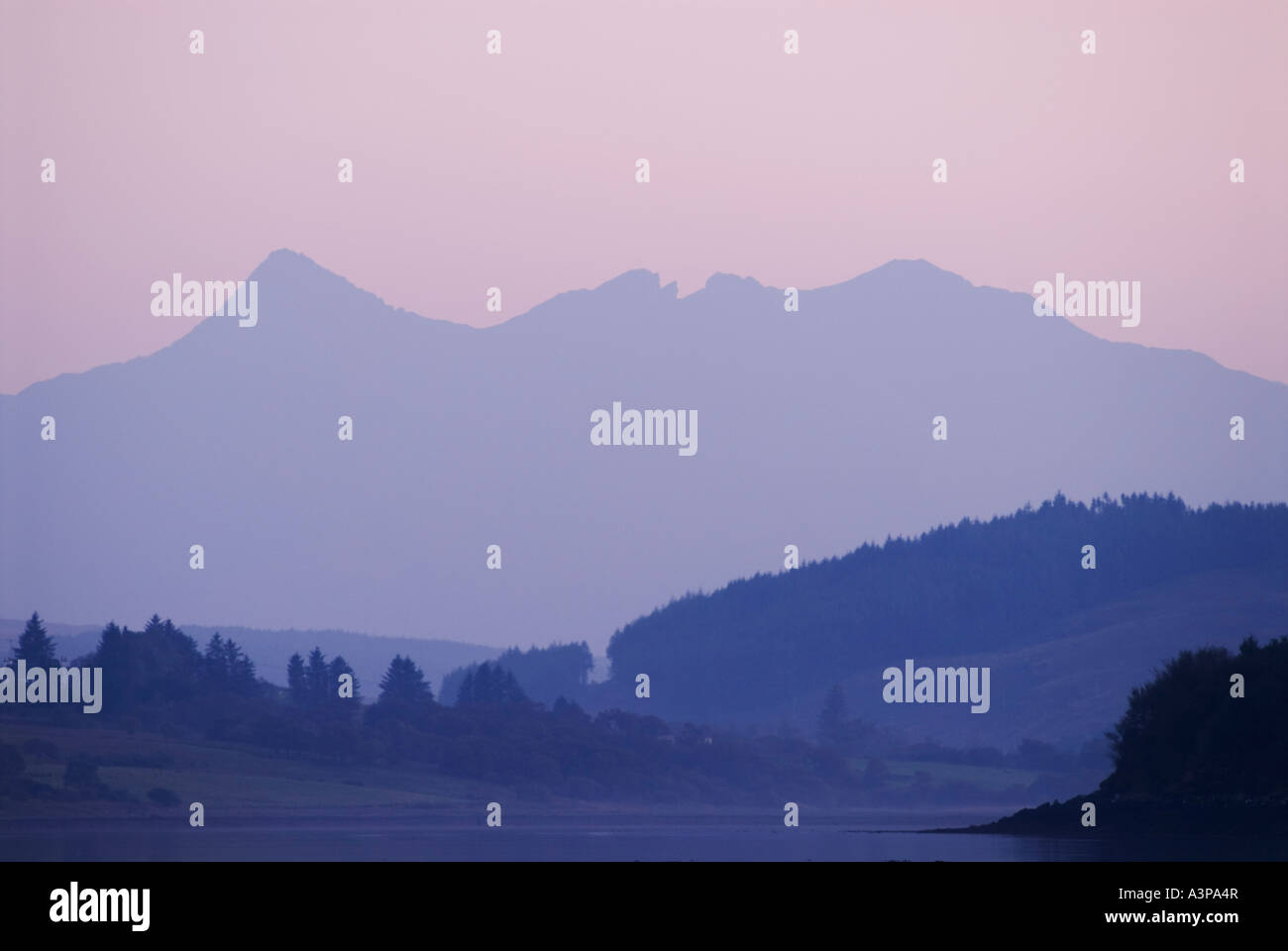 soft light over Black Cuillin mountains from Portree bay, Isle of Skye ...