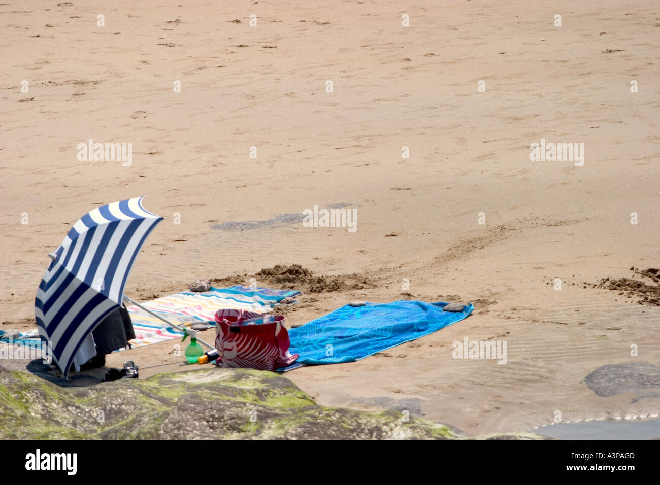 Group of people relaxing on beach under tent hi-res stock photography ...