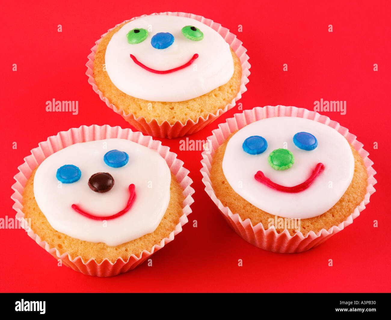 Pink Smiley Face Cupcake