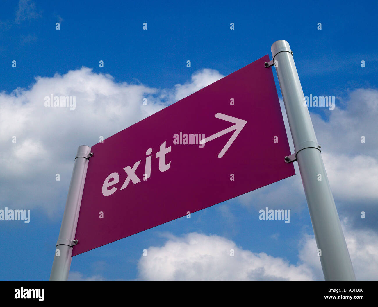 PURPLE CAR PARK EXIT SIGN ON BLUE SKY Stock Photo - Alamy
