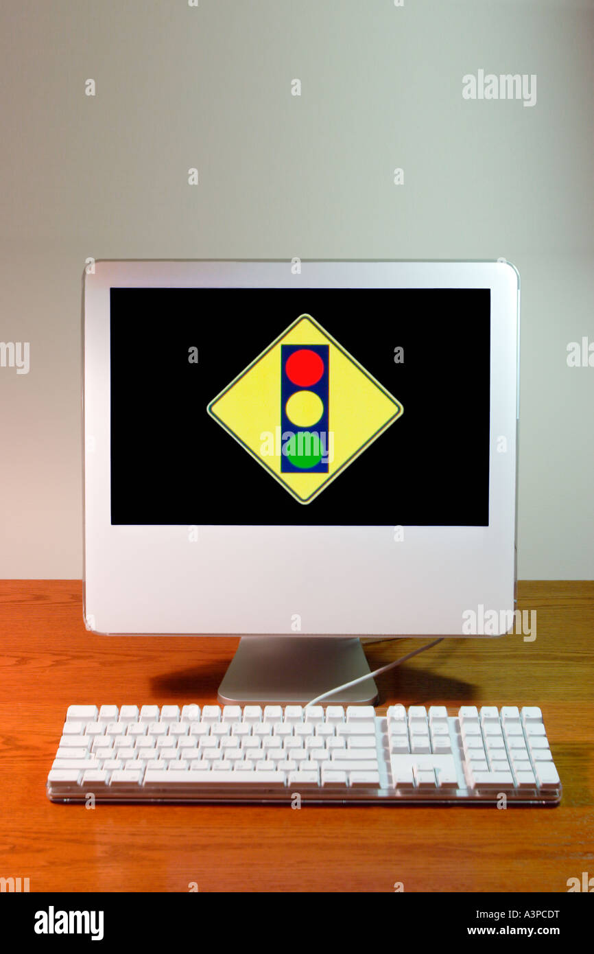 Apple computer with street light sign on screen Stock Photo - Alamy