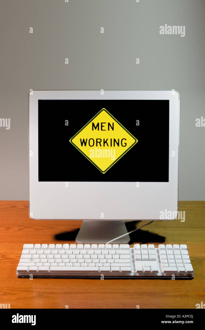 Apple computer with men working sign on screen Stock Photo - Alamy