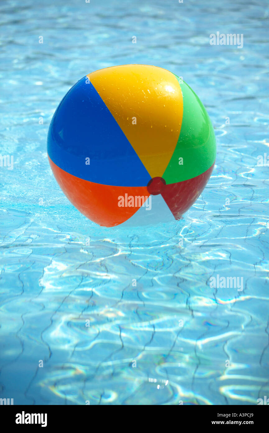 coloured beach ball in the pool Stock Photo - Alamy