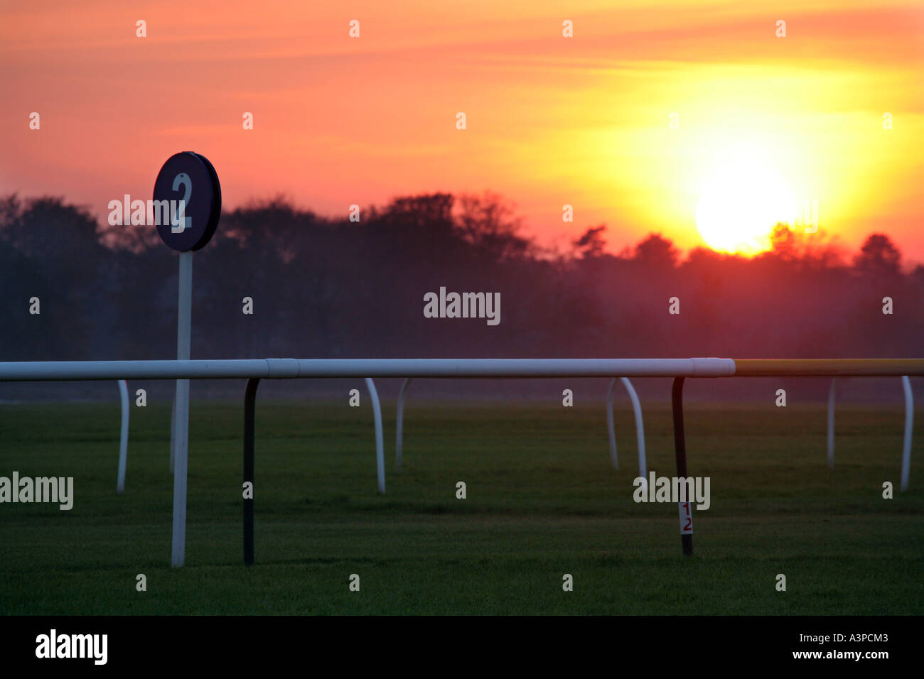 Newmarket Racecourse at sunset, two furlong marker, Suffolk UK Stock ...