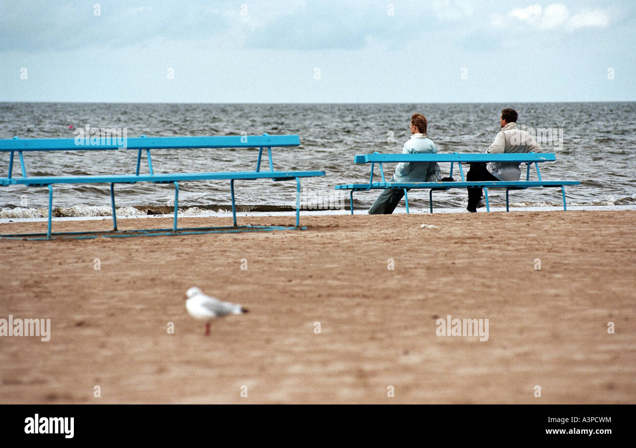 Tourists on a beach bench at the Gulf of Riga, Latvia Stock Photo - Alamy