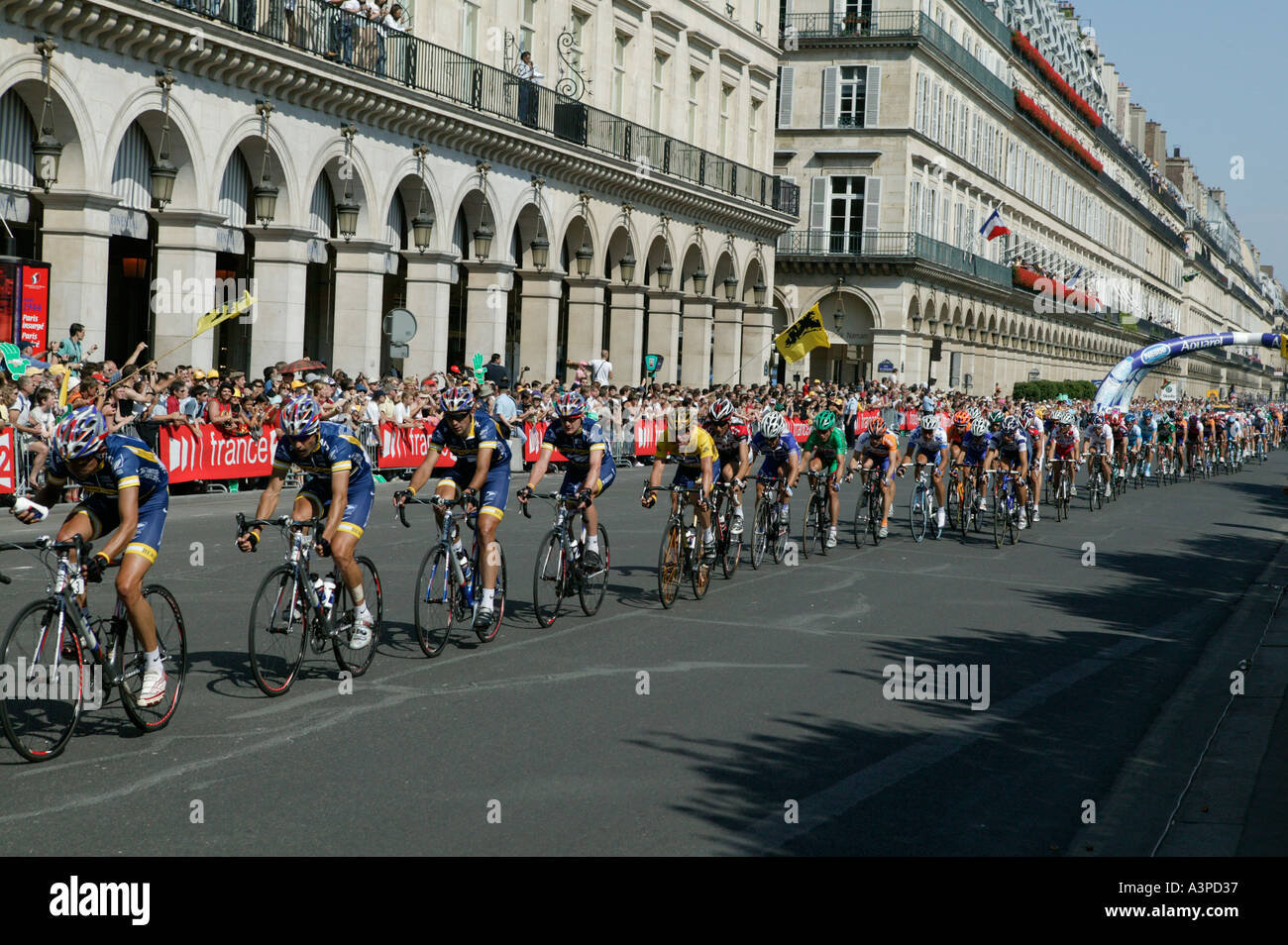 Tour de France leader Lance Armstrong in yellow jersey rides up rue de ...