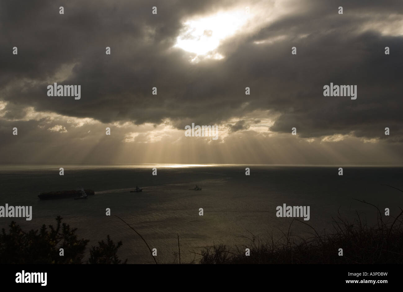 Sun beams over the south devon coast Stock Photo - Alamy