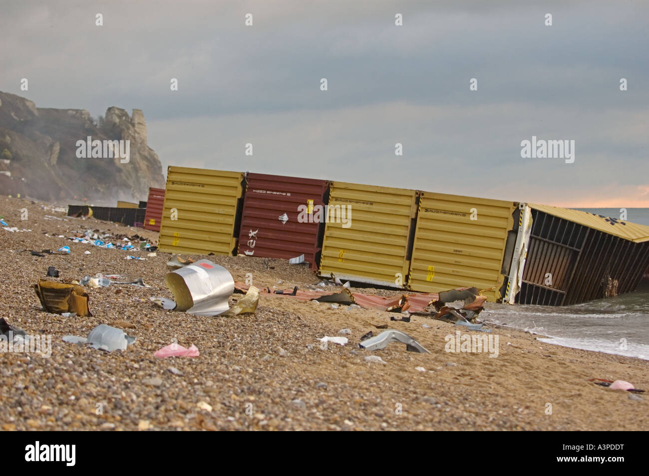Containers locked together where they washed up on the shore Stock ...