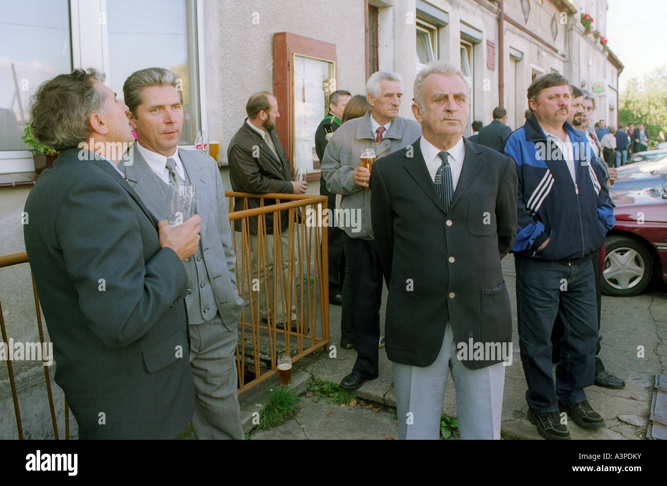 Men drinking beer outdoors, Poland Stock Photo - Alamy