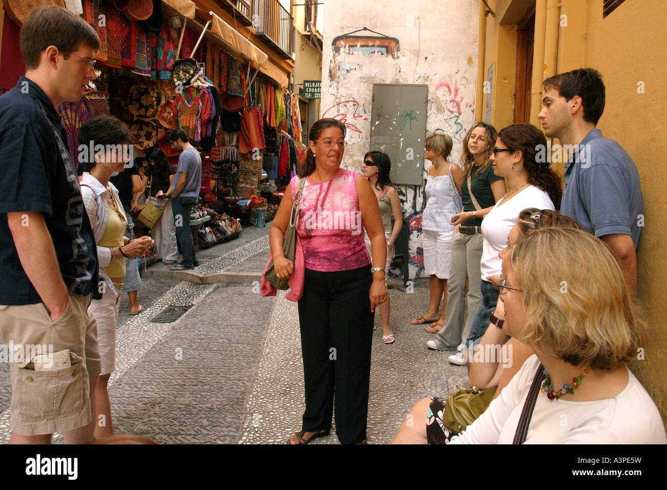 tour guide explaining the history of some of streets in Granada Spain ...