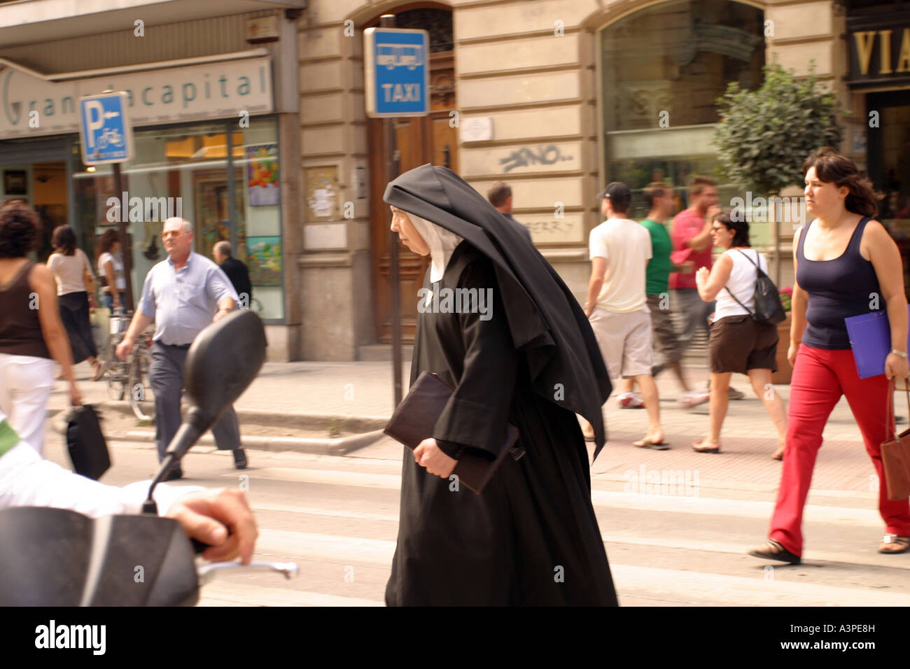 nun crossing street, Granada Spain Stock Photo - Alamy