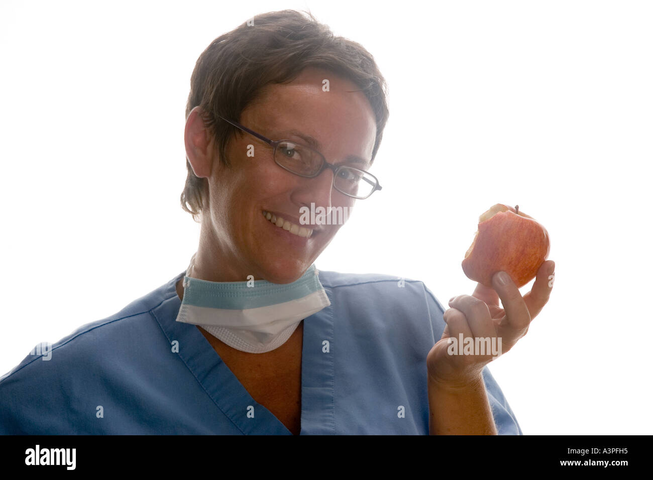 Doctor smiling apple vitality hi-res stock photography and images - Alamy