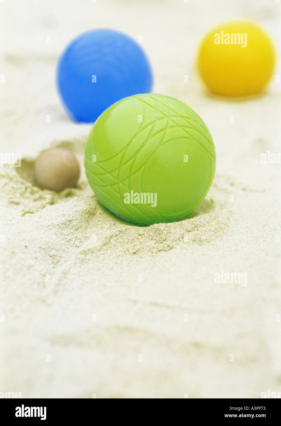 Petanque balls in sand Stock Photo - Alamy
