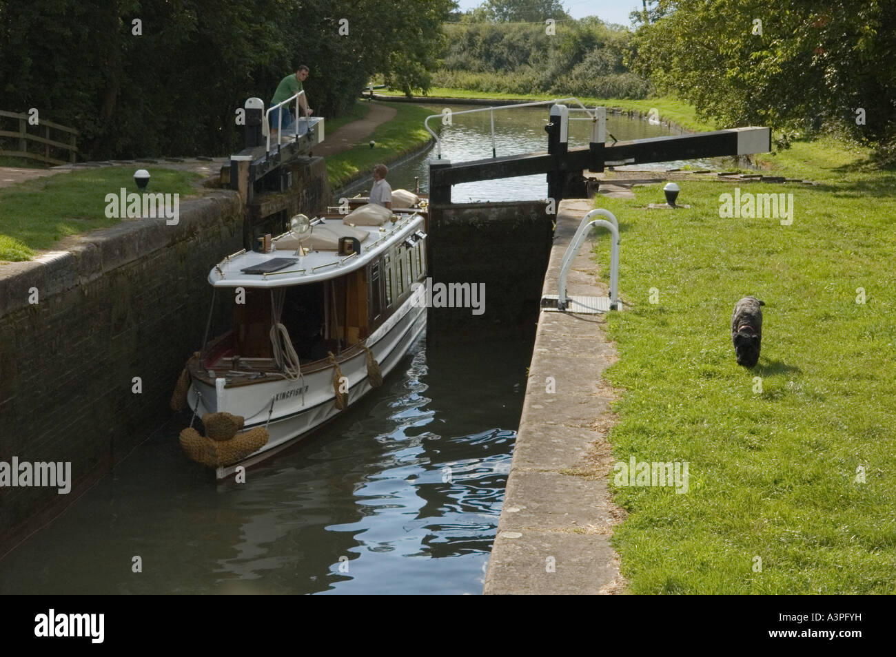 Narrow boat entering canal lock at bulbourne herts Stock Photo - Alamy