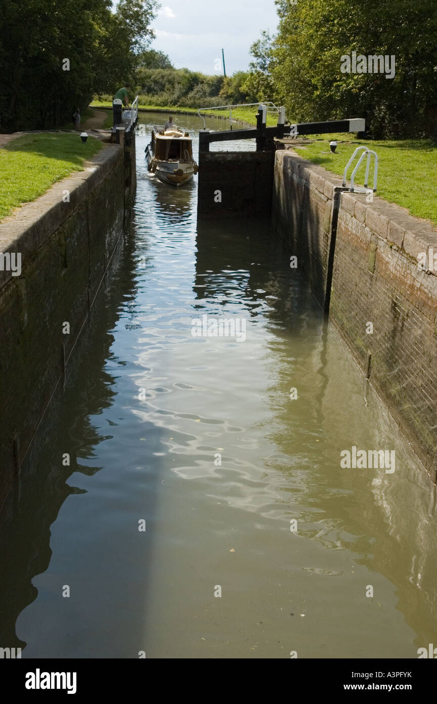 Canal lock awaiting approach of narrow boats Stock Photo - Alamy