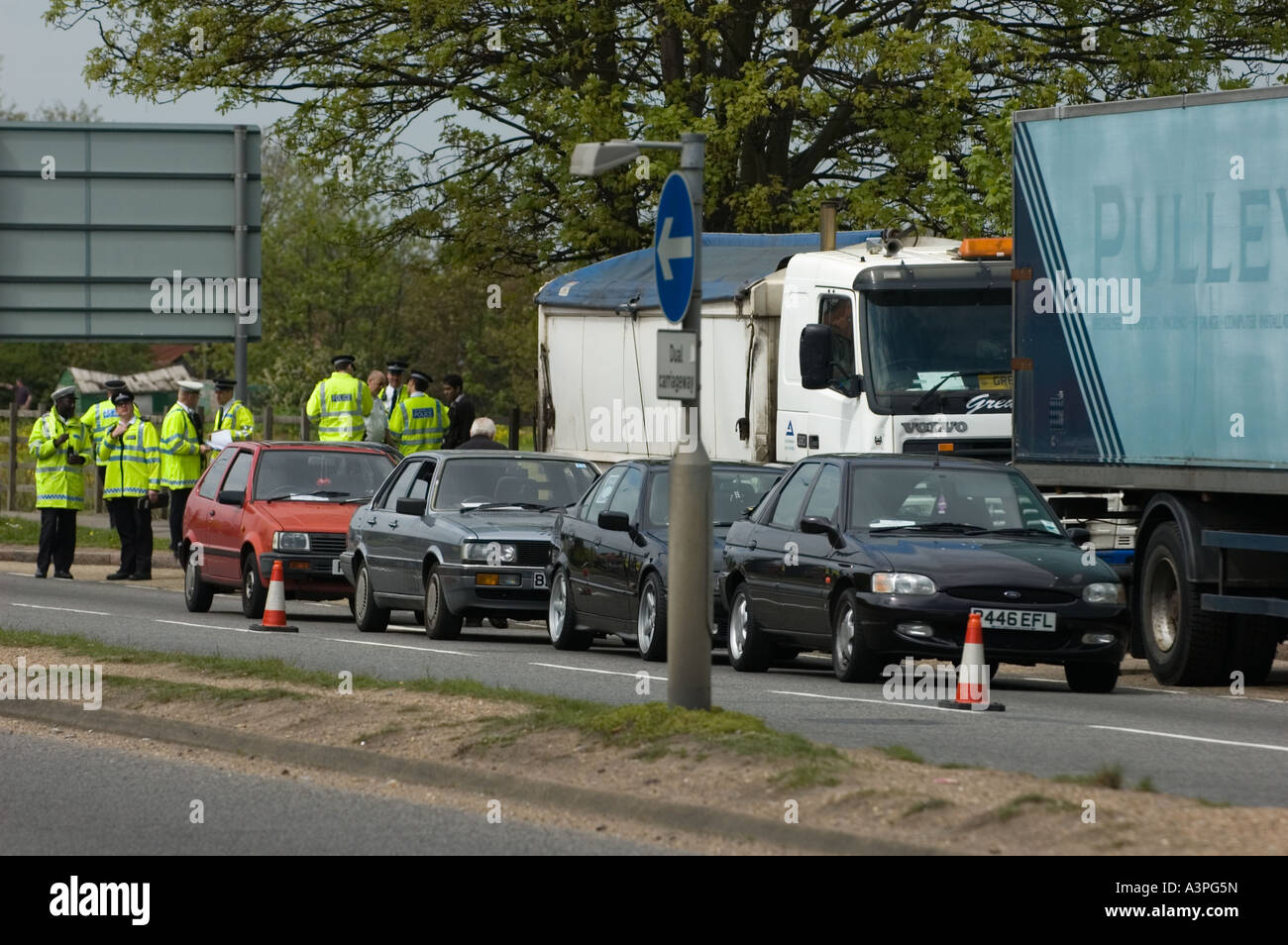 Police road block in hounslow, West London Stock Photo - Alamy