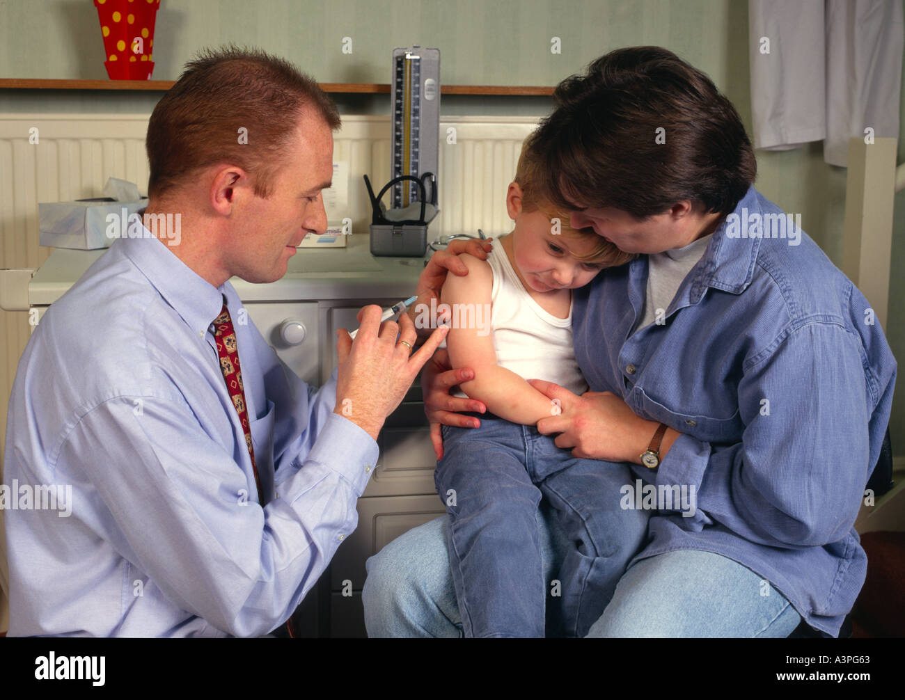 Doctor giving toddler injection Stock Photo - Alamy