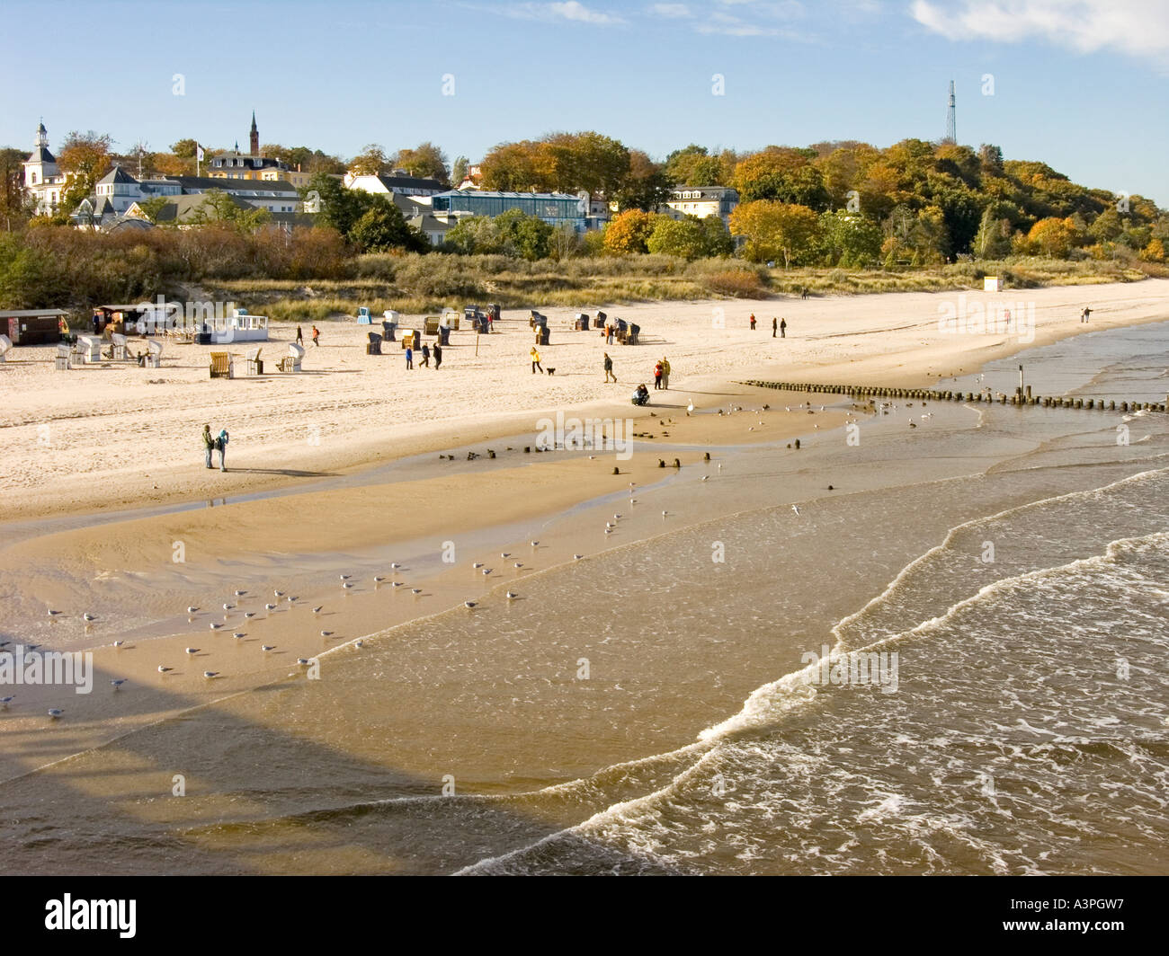 people having a walk on the beach of Heringsdorf island Usedom in ...