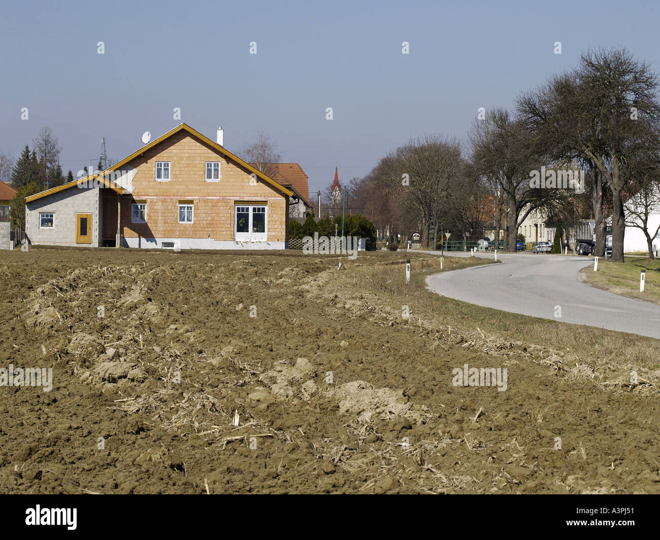 newly built houses in the country field Stock Photo - Alamy
