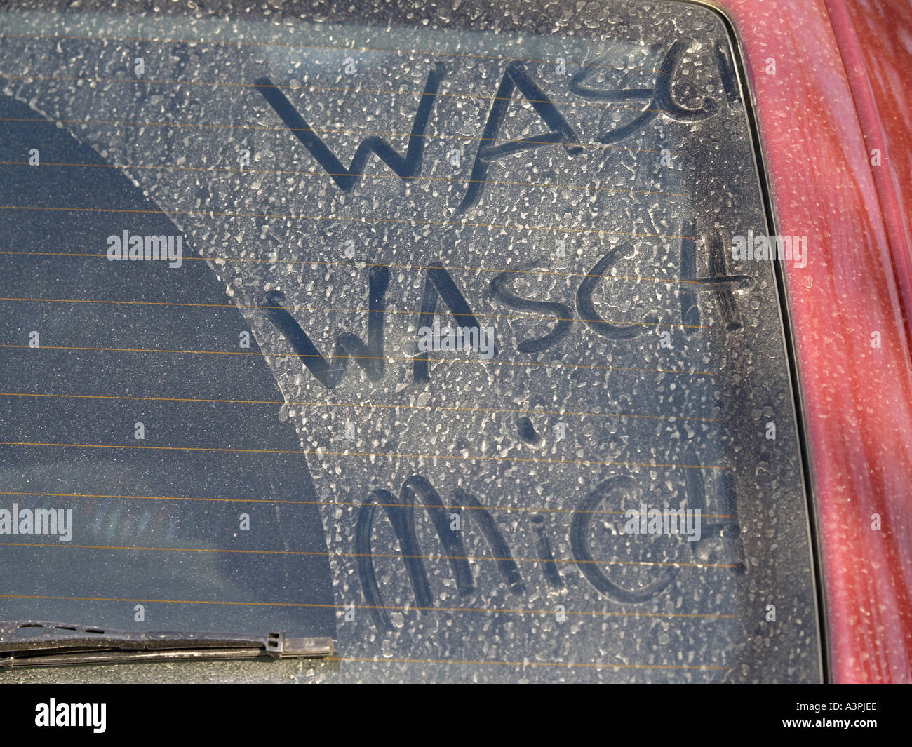 wash me, dirty back window of a car Stock Photo - Alamy