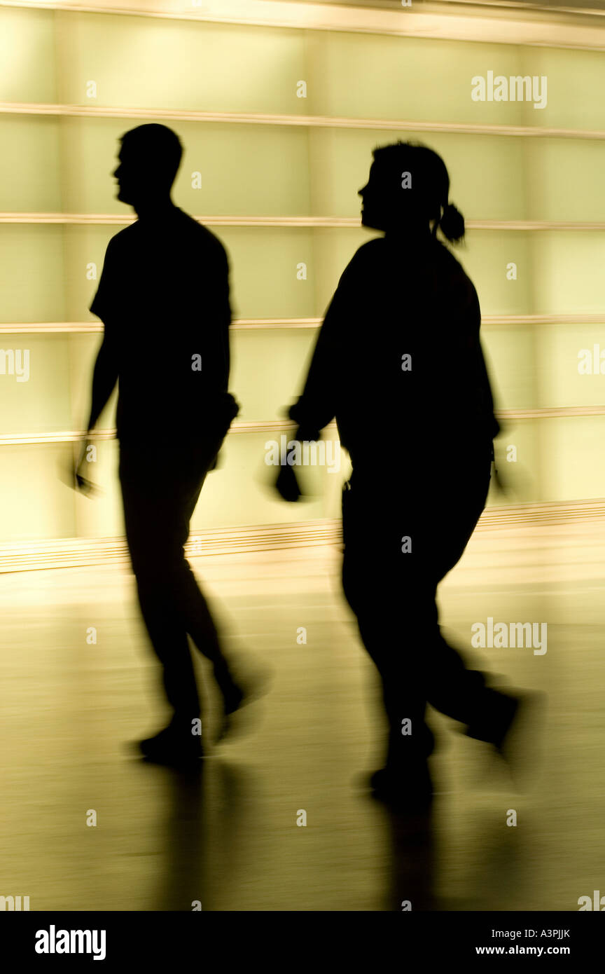 Silhouette of a man and a corpulent woman Stock Photo - Alamy