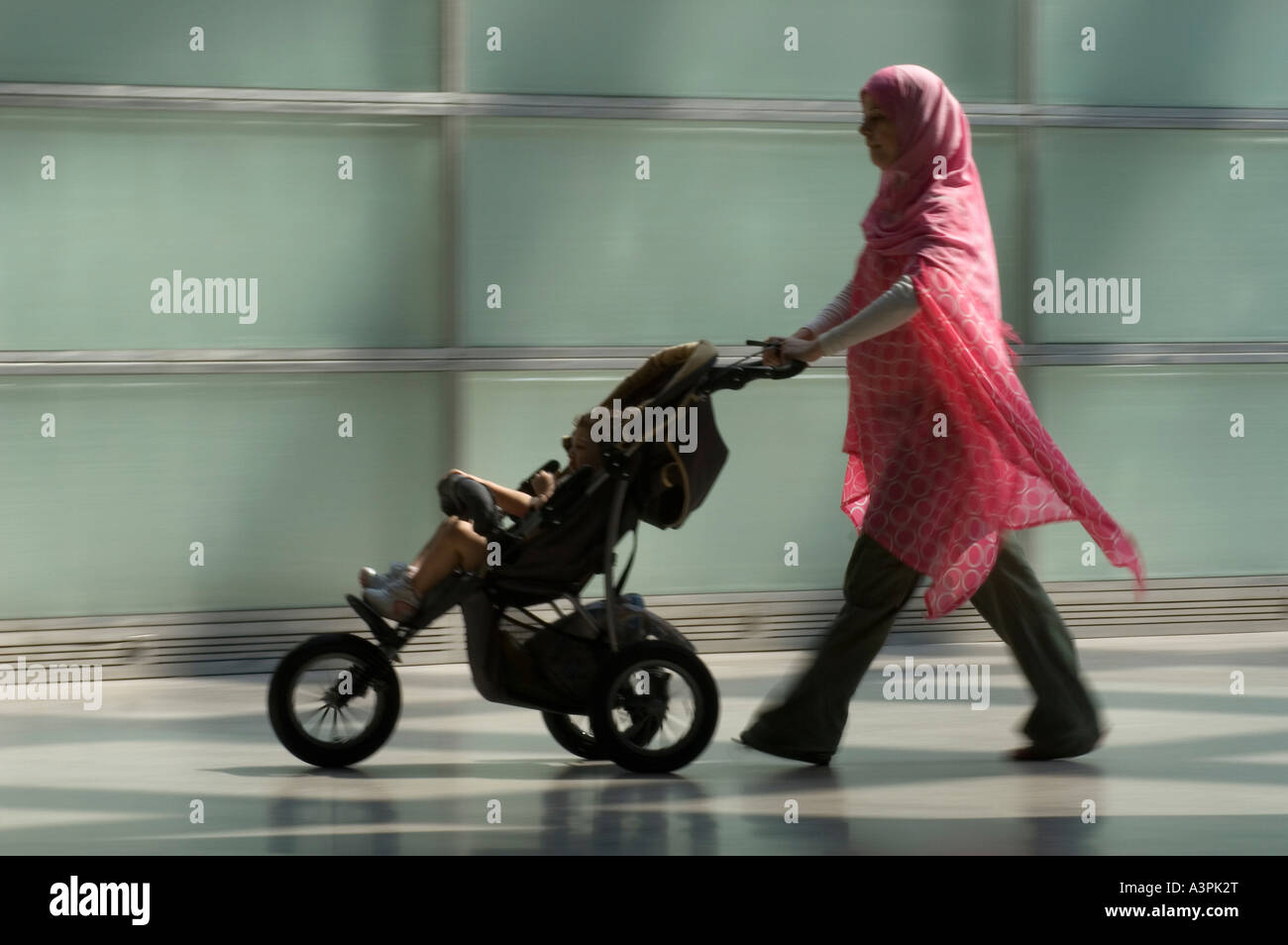 Silhouette of a Turkish mother with a baby stroller Stock Photo - Alamy