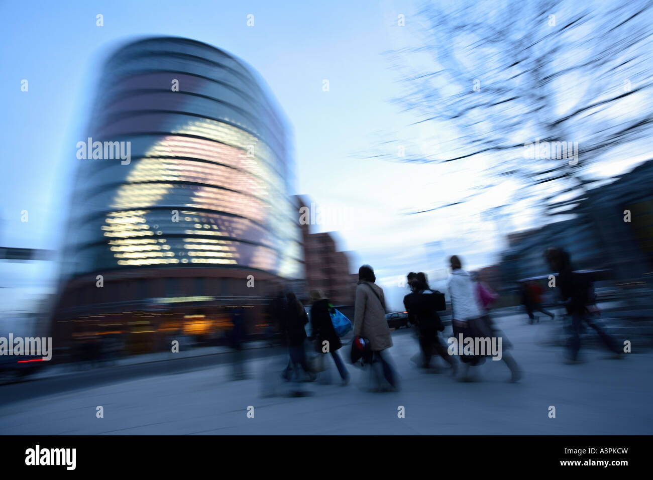 People in front of a building with light installation on it, Berlin ...