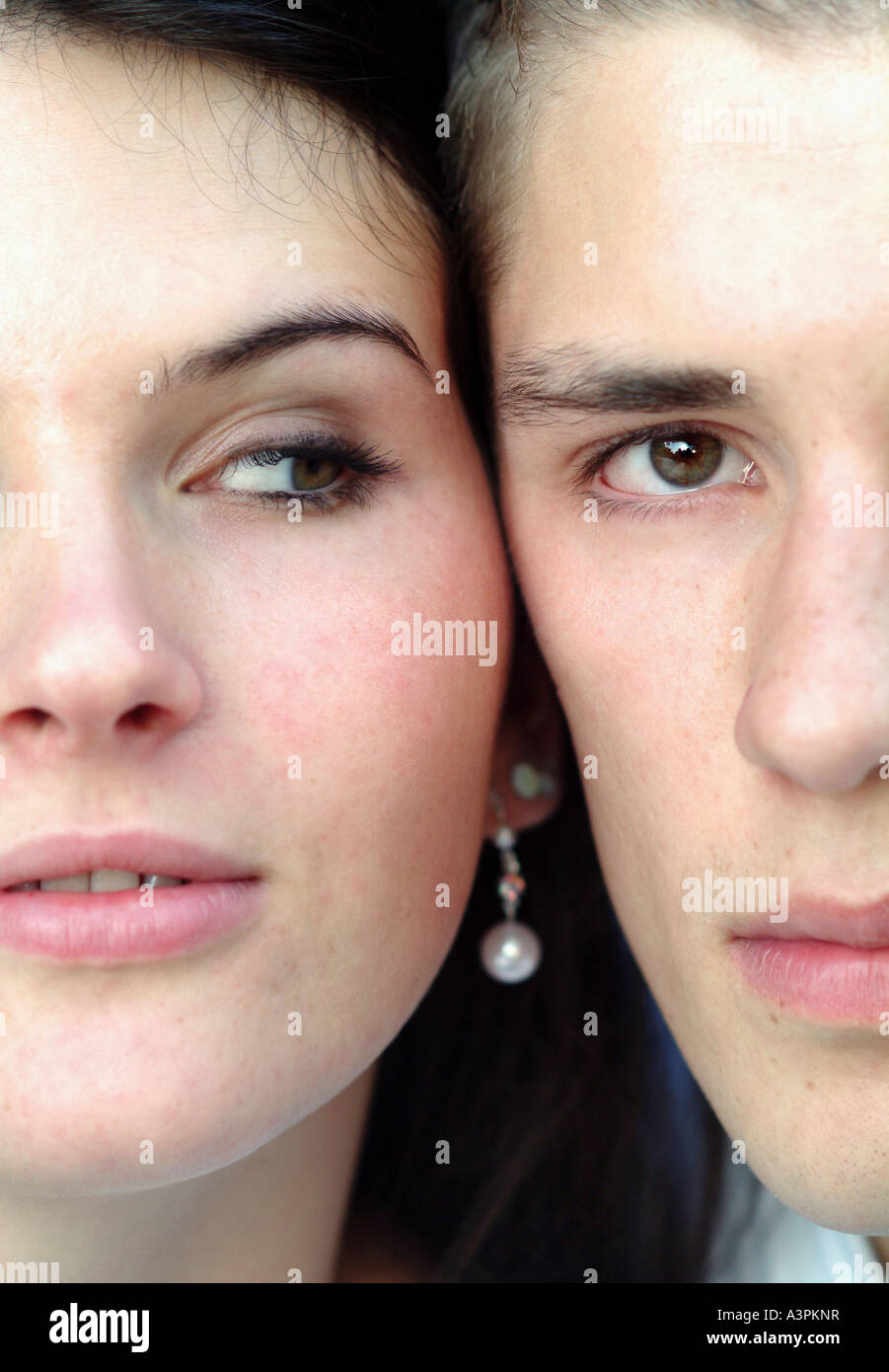 Faces of young couple close to each other Stock Photo - Alamy