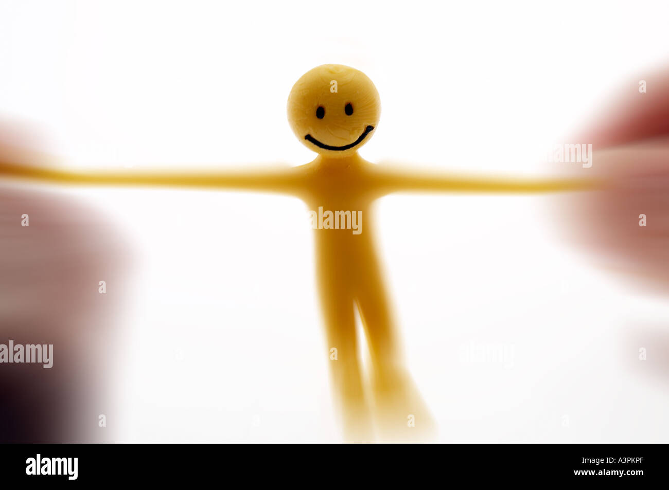 Small man, smiley face, bendy, smiling yellow man Stock Photo - Alamy