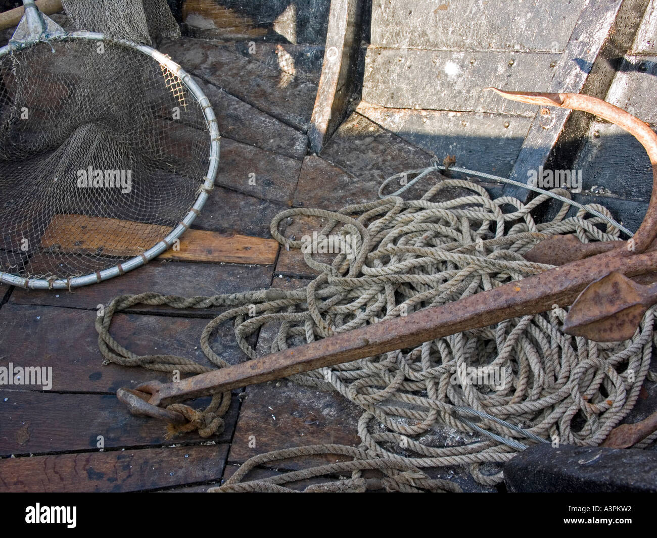 anchor an fishing net in a fishing boat Stock Photo - Alamy