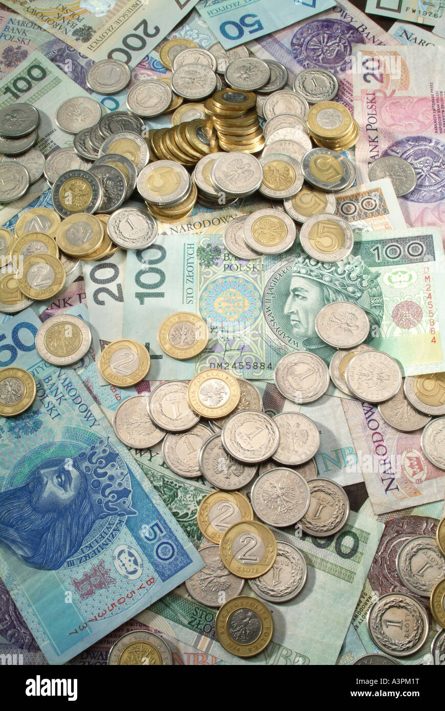 Zloty banknotes and coinage Stock Photo - Alamy
