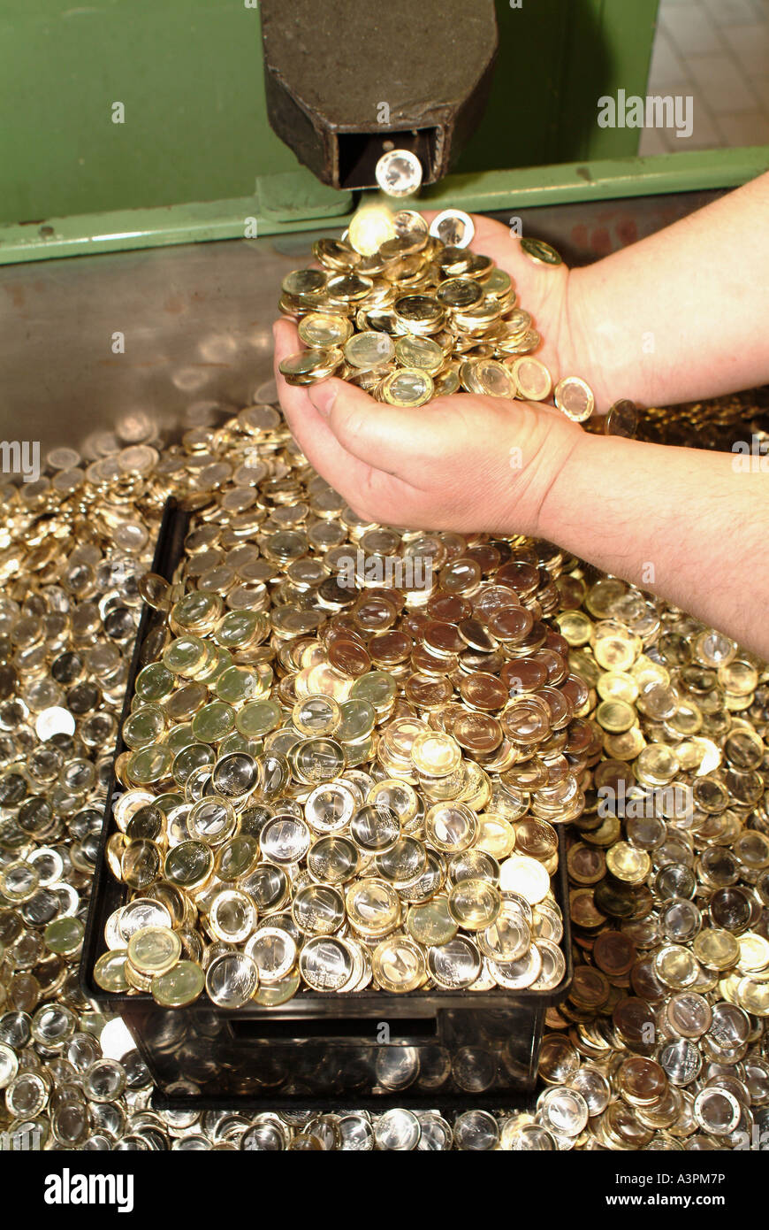 The Hamburg Mint producing Euro coins, Germany Stock Photo - Alamy