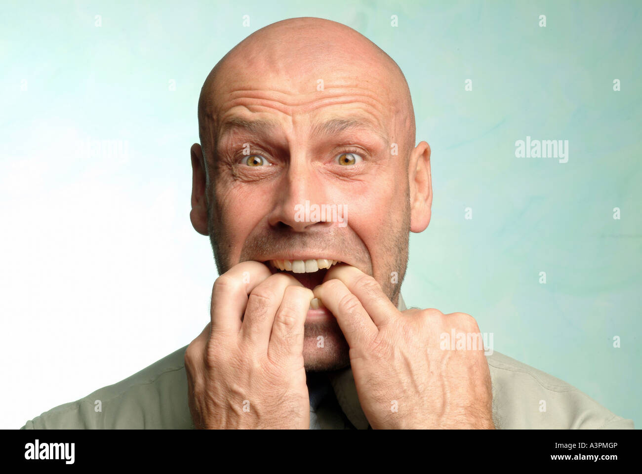 Man with an anticipating look on his face Stock Photo - Alamy