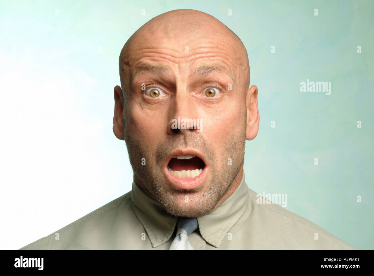 Man with a scared look on his face Stock Photo - Alamy