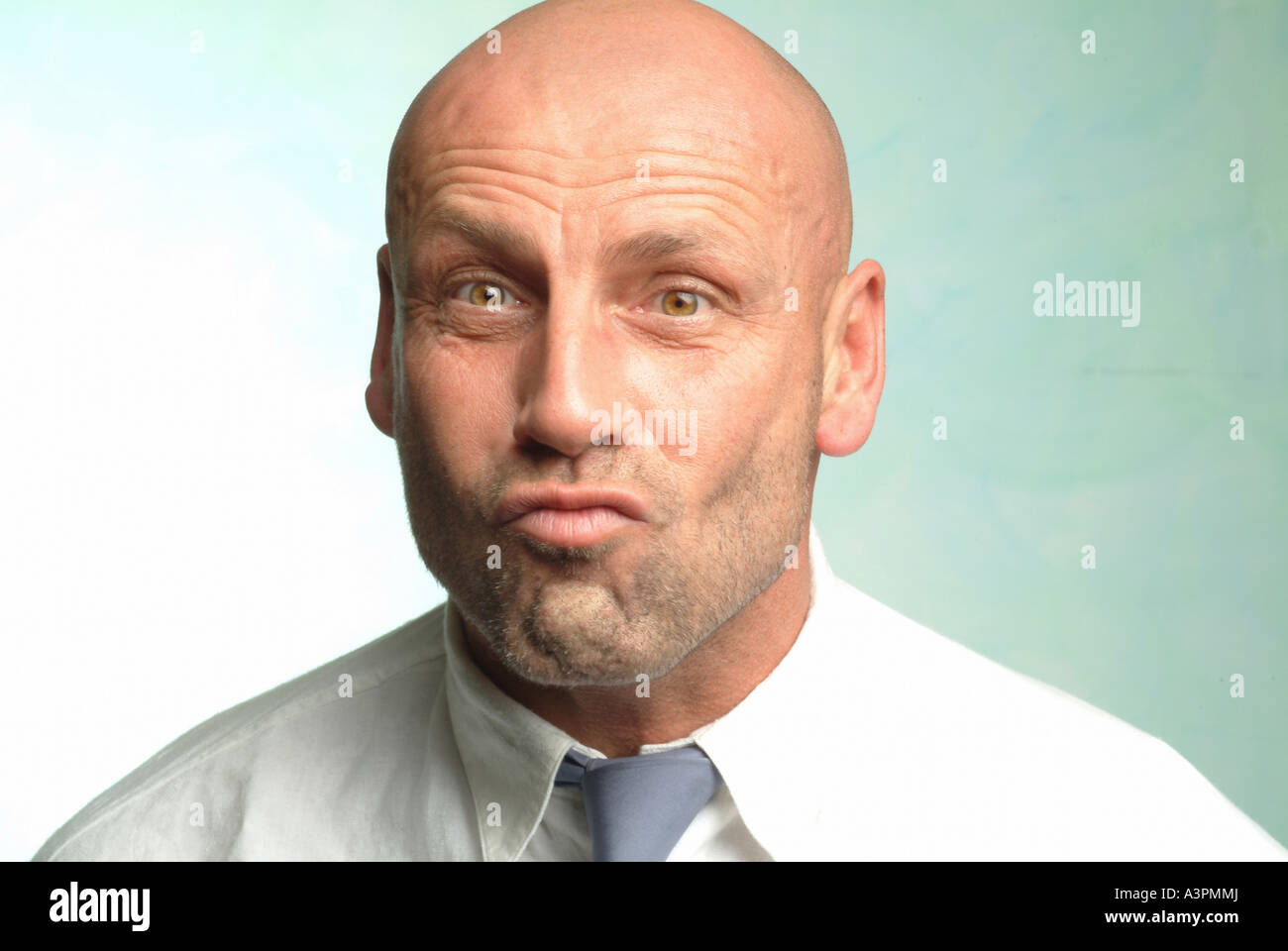 Man with a satisfied look on his face Stock Photo - Alamy