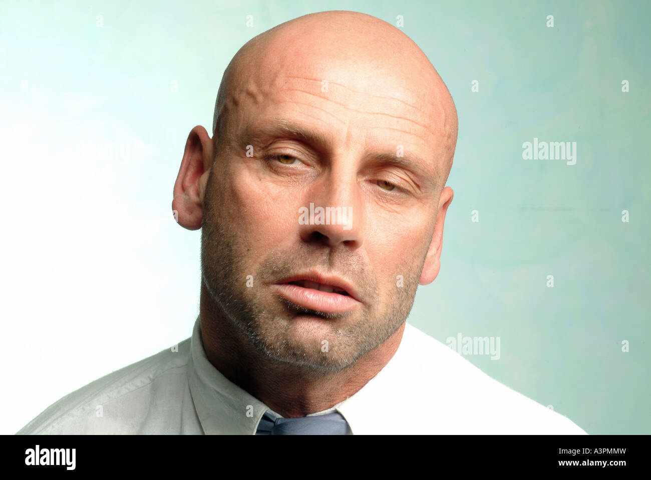 Man looking exhausted Stock Photo - Alamy