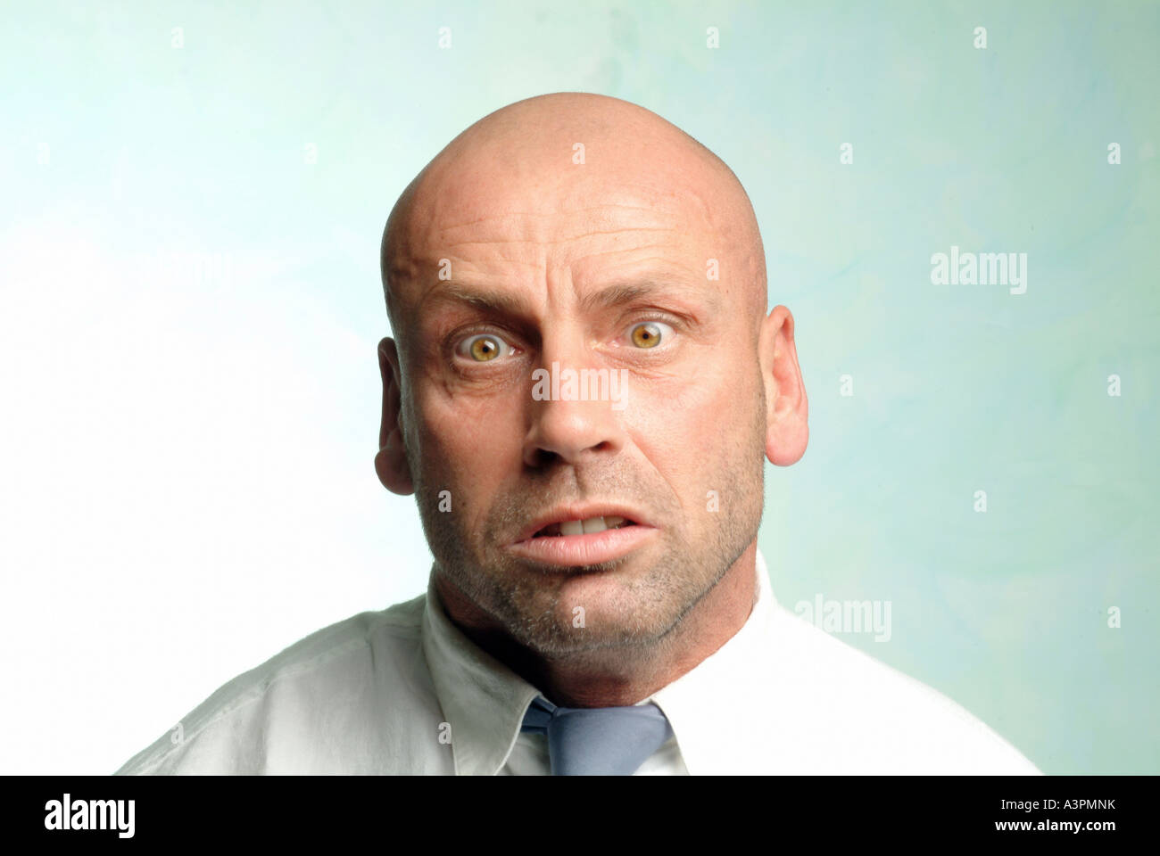 Man with a startled look on his face Stock Photo - Alamy