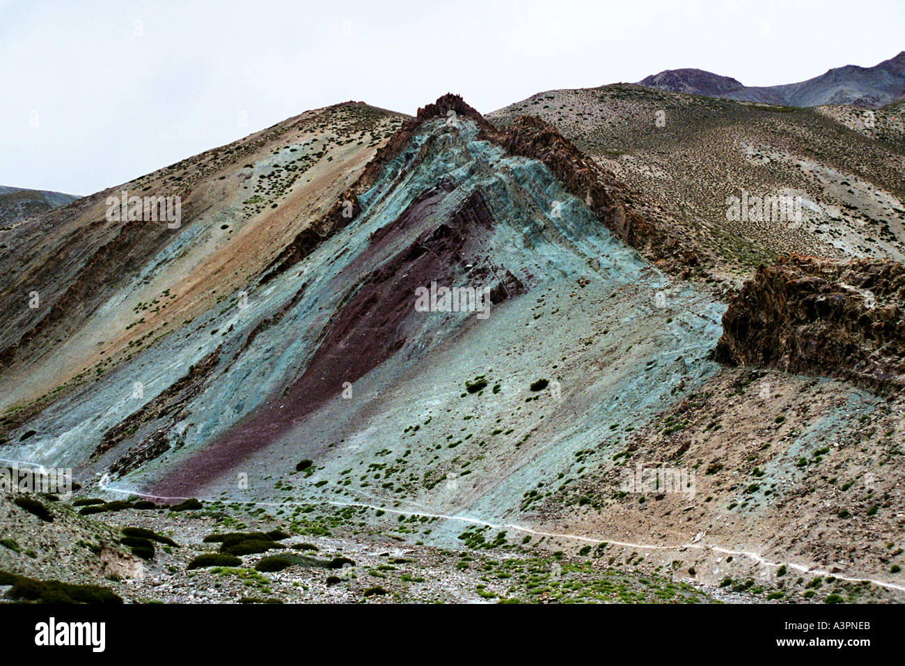 Copper stained scree slopes in the Stok mountains Ladakh Indian Kashmir ...