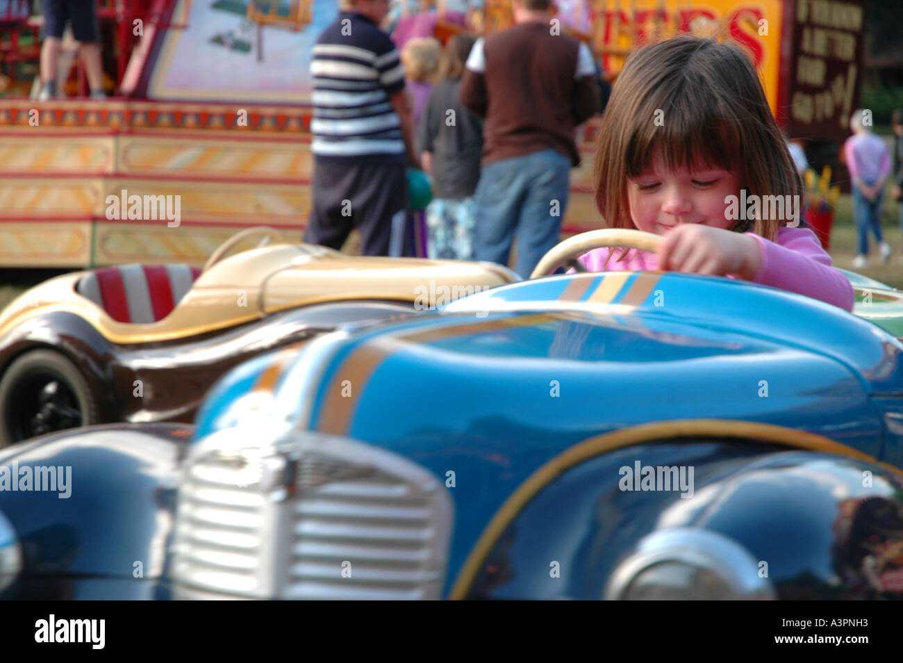 Girl riding a car Stock Photo - Alamy