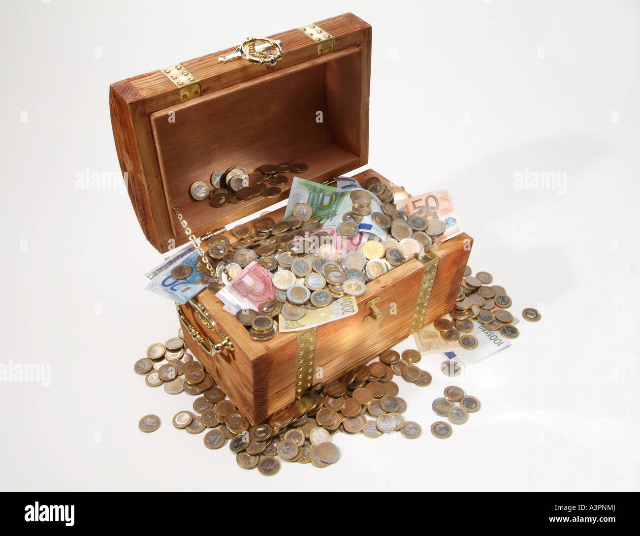 A treasure chest filled with money Stock Photo - Alamy