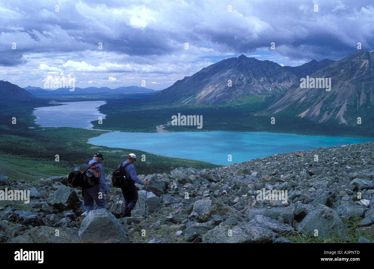 Hikers at Low Pass above Twin Lakes LChigmit Mountains Lake Clark ...