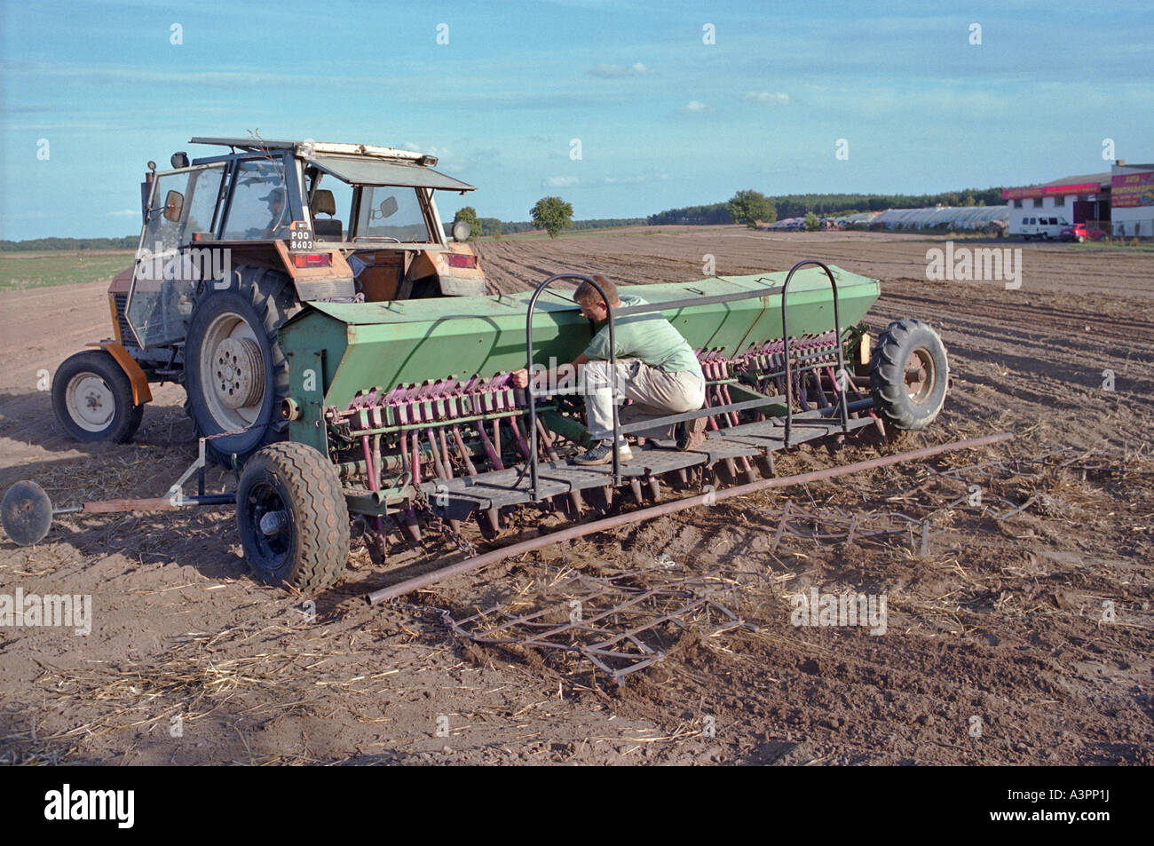 A farm machine on a field, Pniewy, Poland Stock Photo - Alamy