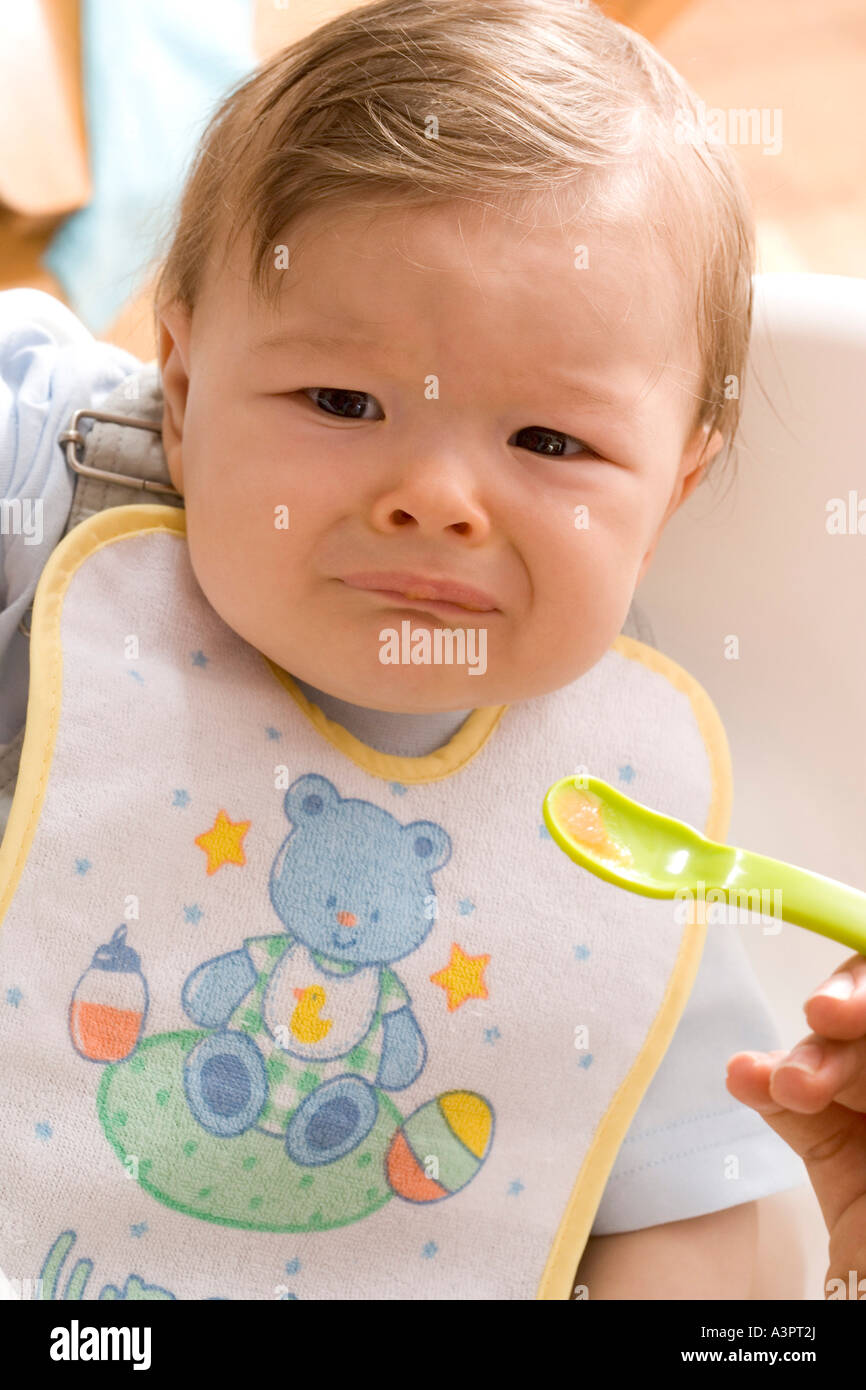 mother feeding her baby Stock Photo - Alamy