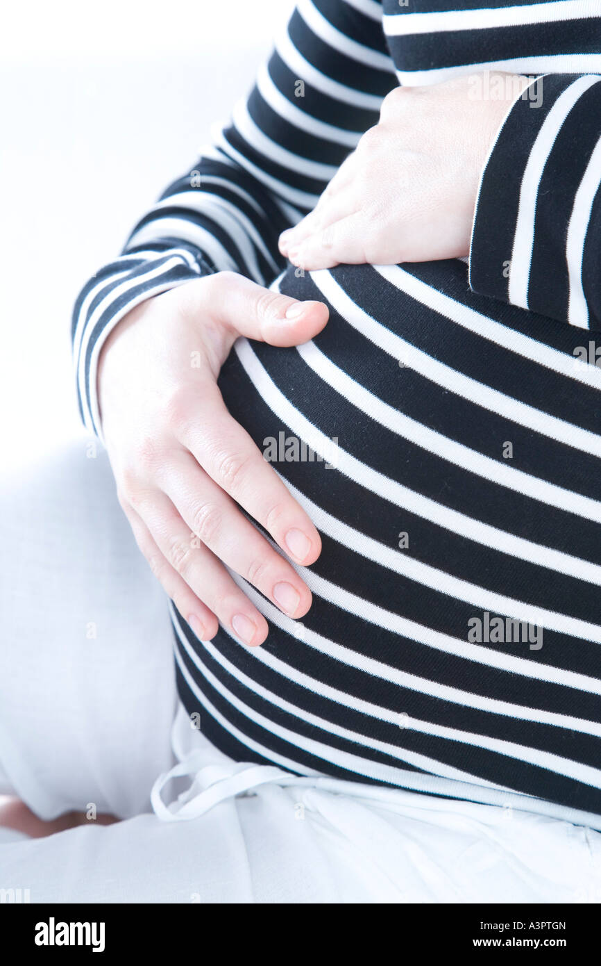 Belly touch touching vital hi-res stock photography and images - Alamy