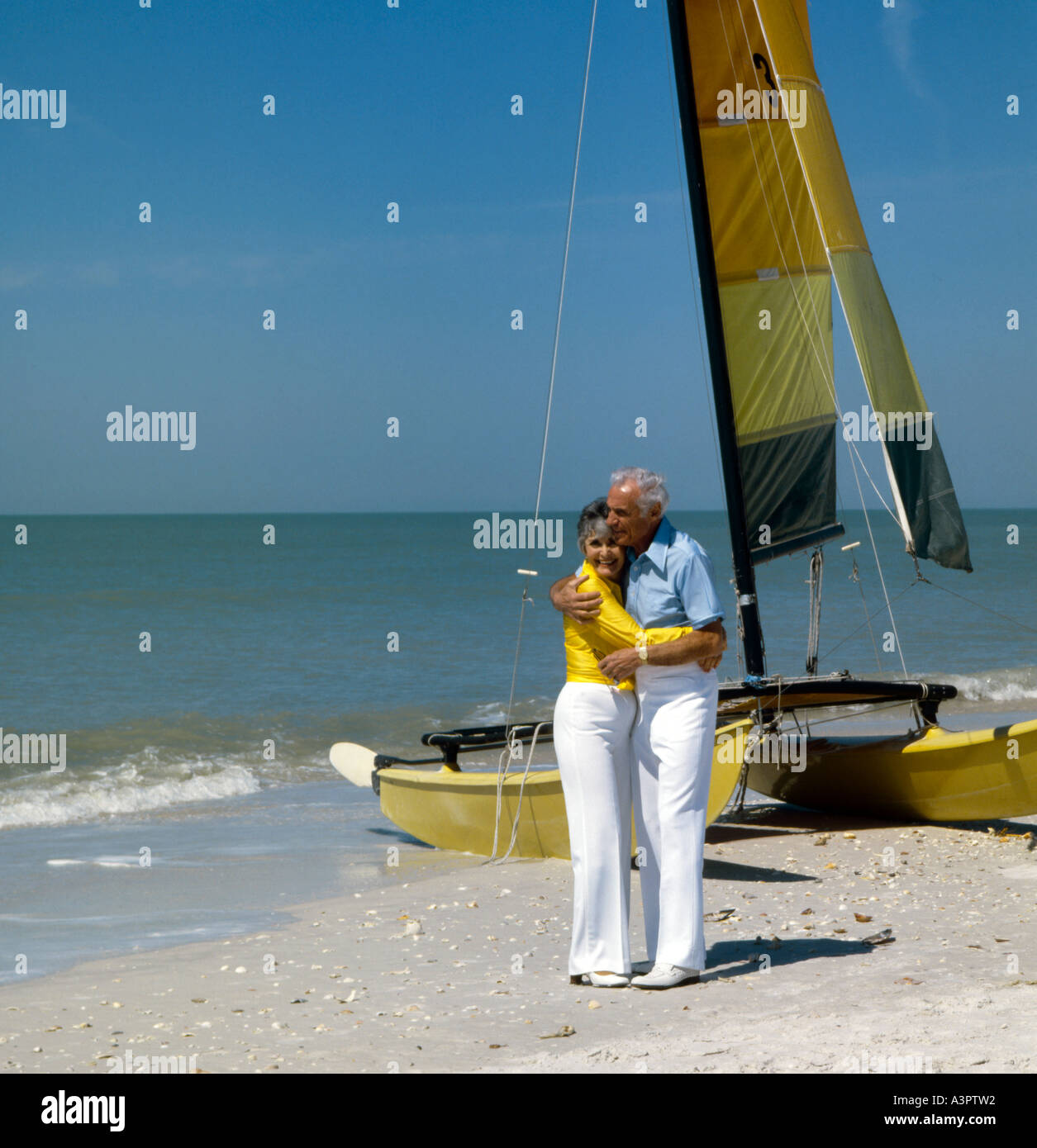 Pensioners enjoying togetherness on a tropical beach Stock Photo - Alamy