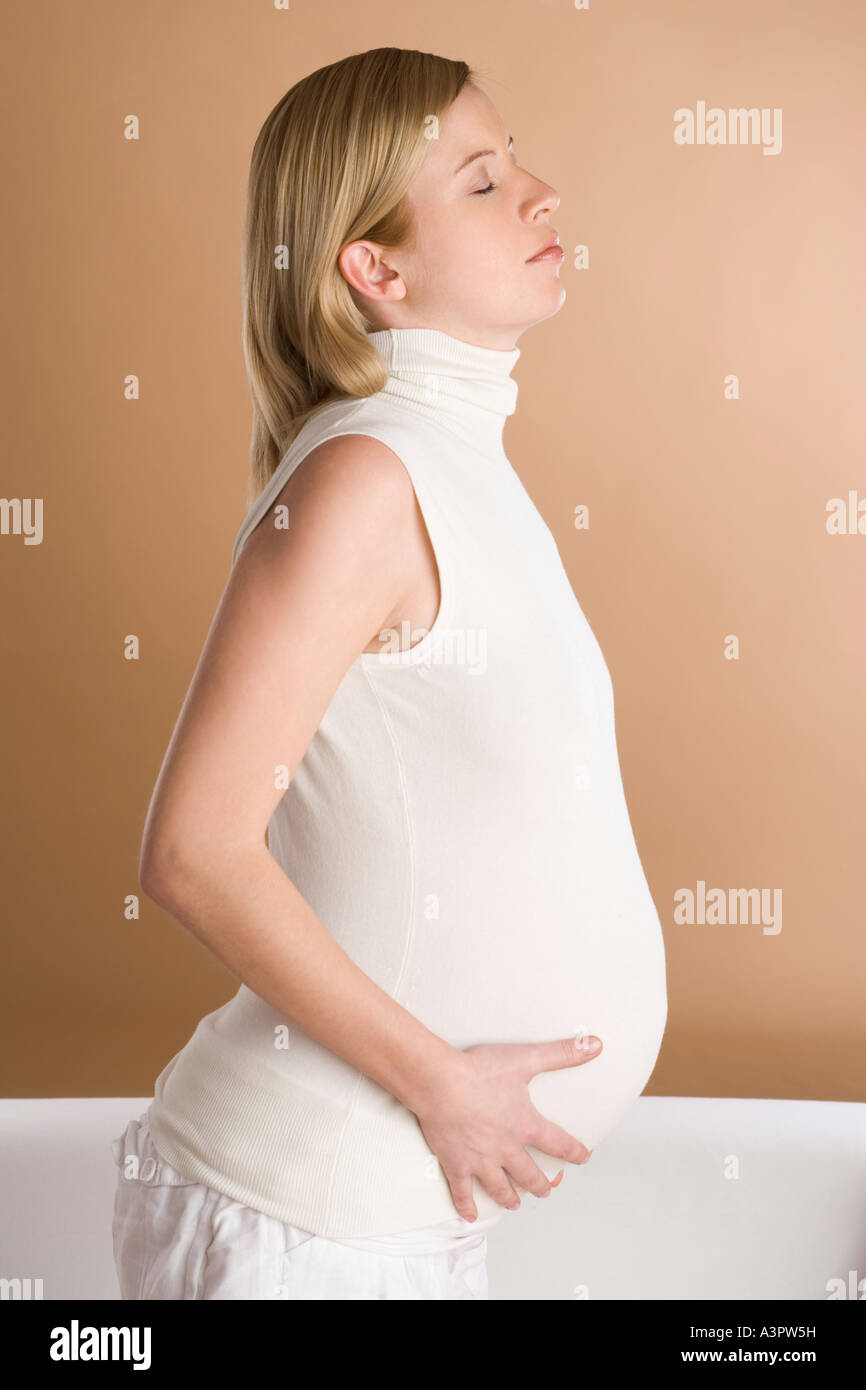 pregnant woman with stomach ache Stock Photo - Alamy