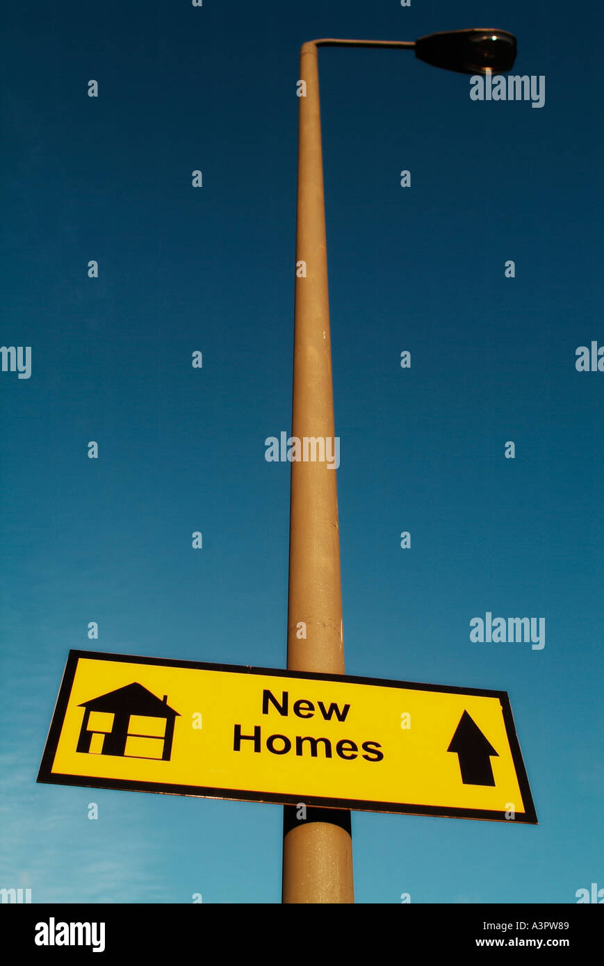 New homes sign on a lamp post London England Stock Photo - Alamy