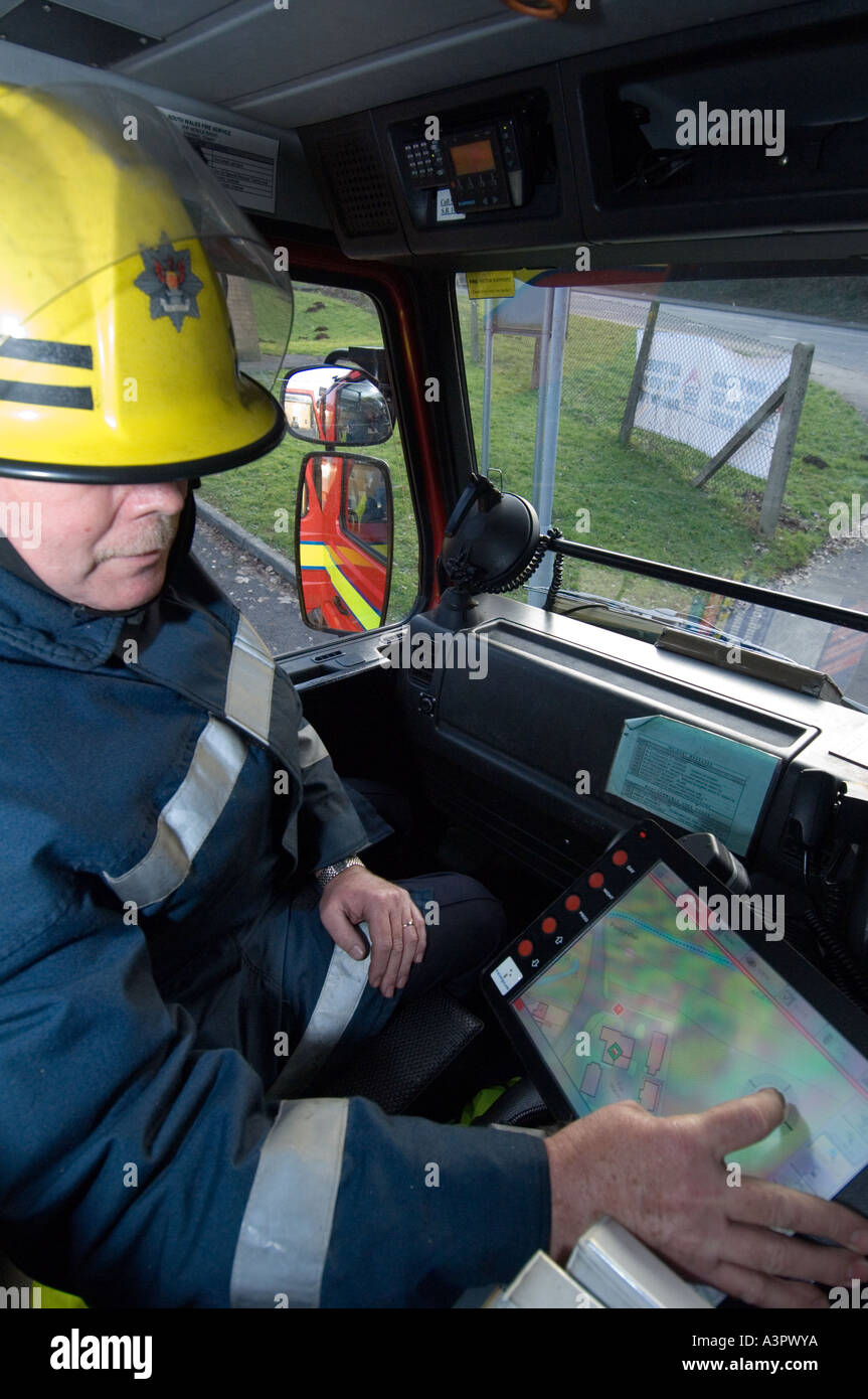 Firefighter Jim O Donoghue operates Data2 cab electronic mapping system ...