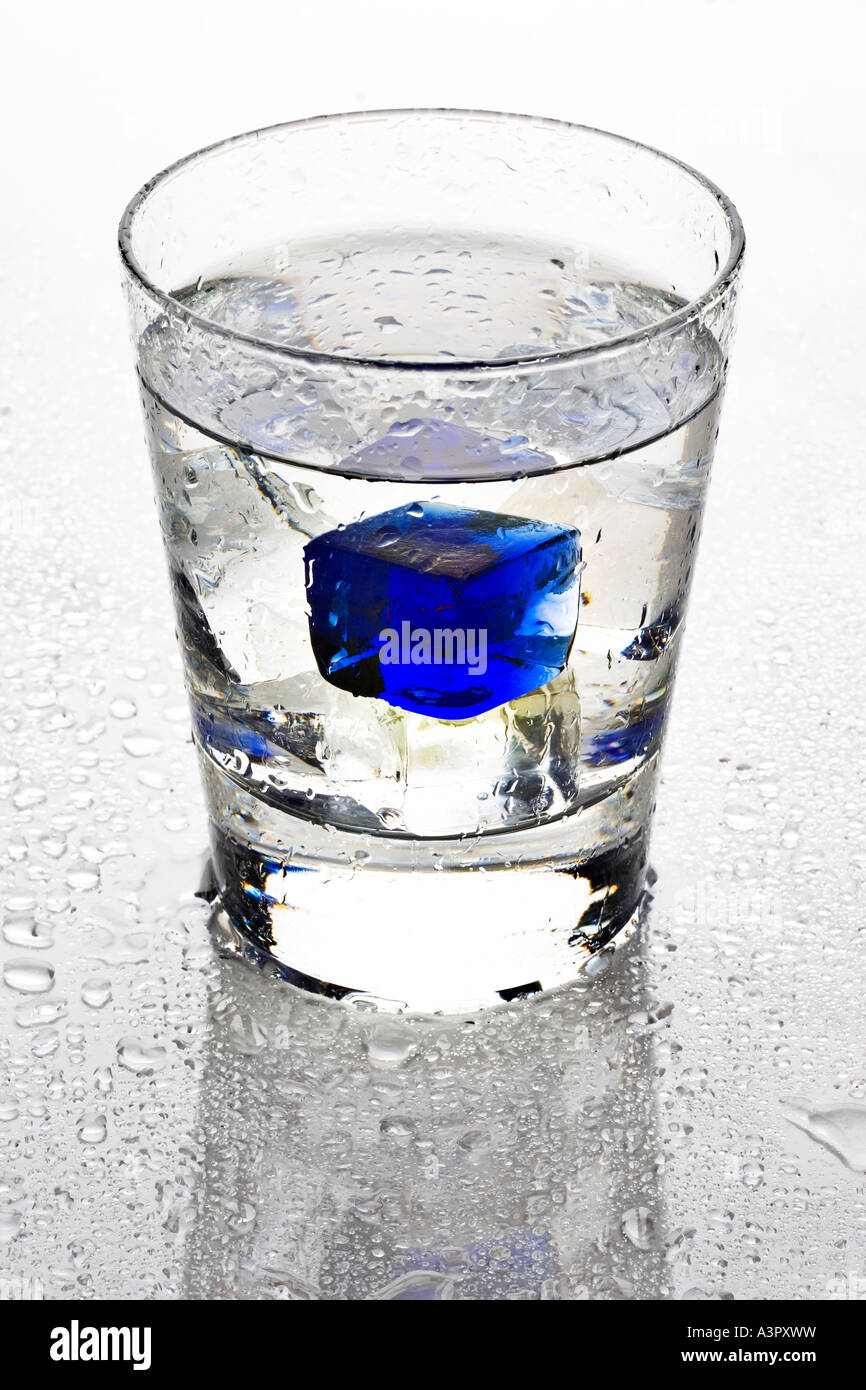 Clear beverage with blue ice cubes Stock Photo - Alamy